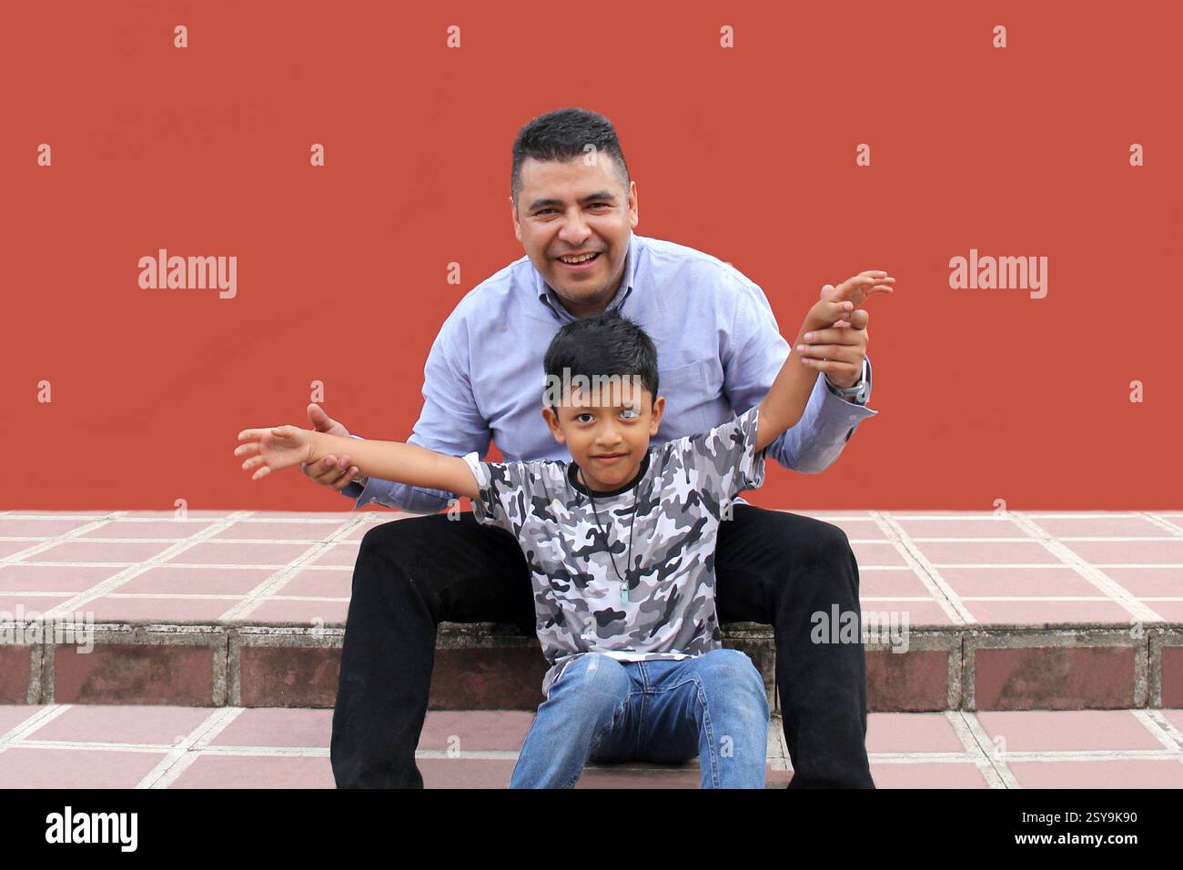 Divorced single dad spends quality time with his 5-year-old dark ...