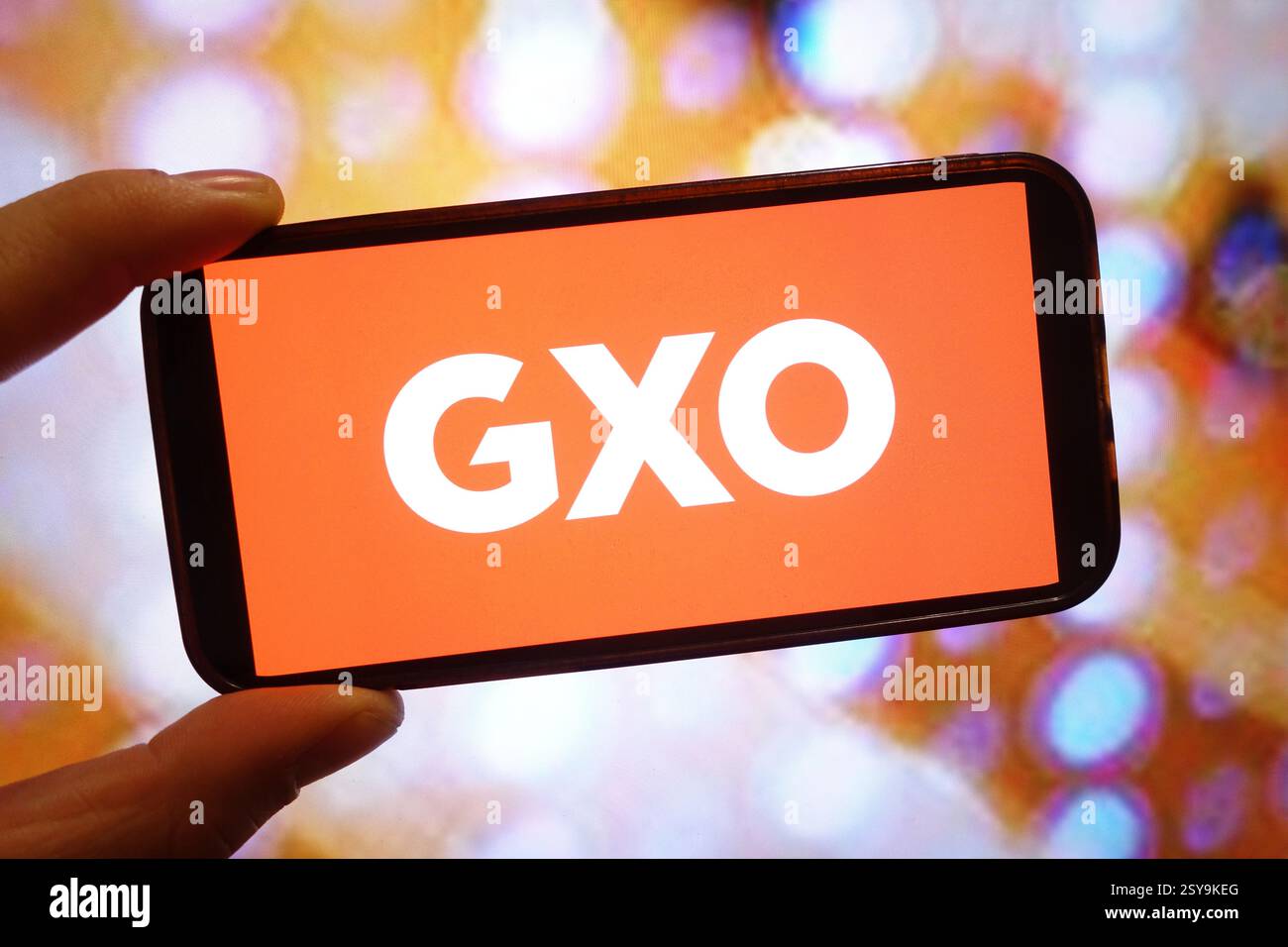 In this photo illustration, the GXO Logistics company logo is seen ...
