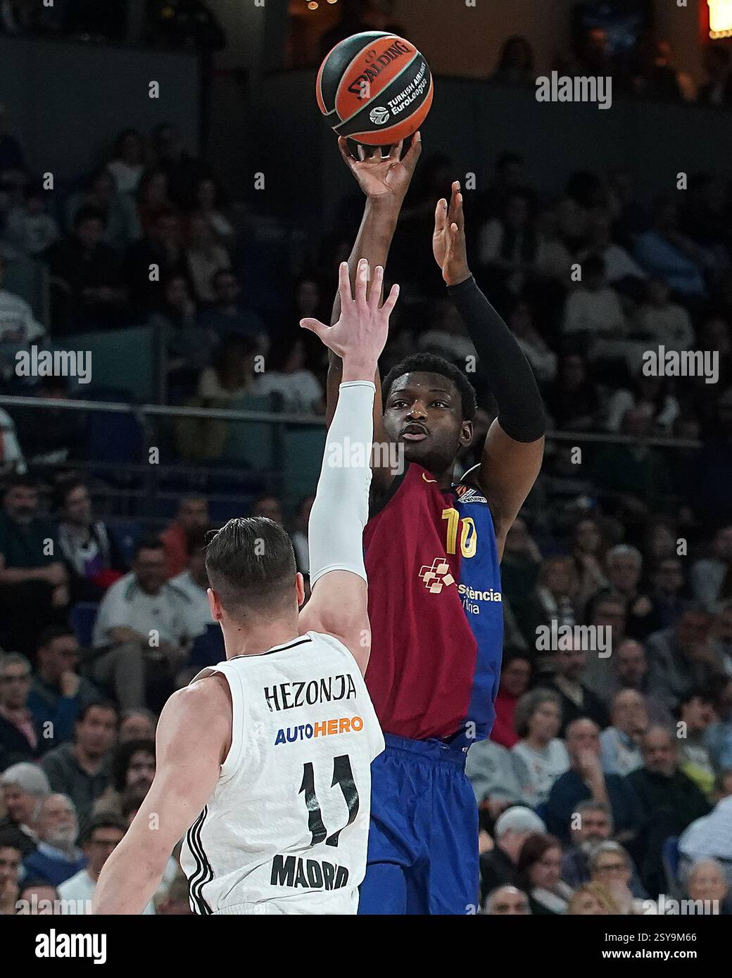 Madrid, Spain. 27th Feb, 2025. Real Madrid's Mario Hezonja (l) and FC ...