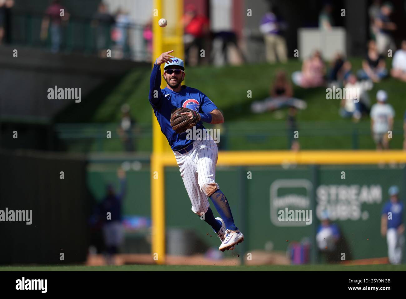 Chicago Cubs shortstop Dansby Swanson throws to first base to get Los ...