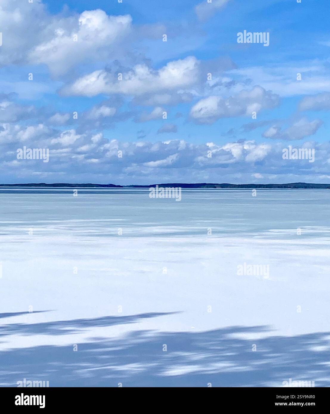 Frozen and snowy lake Saimaa in Finland Stock Photo - Alamy