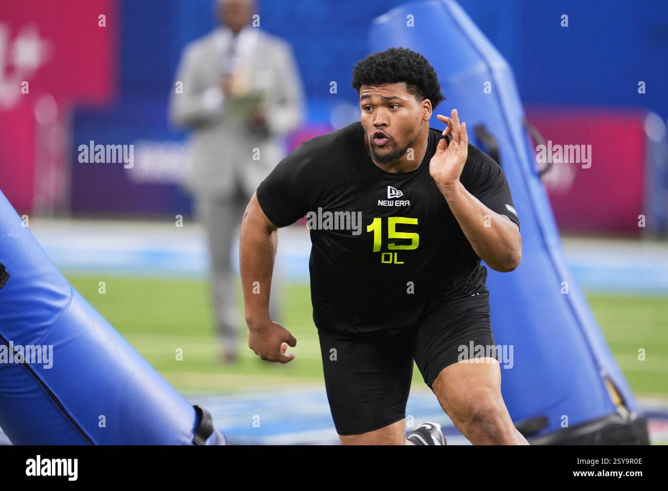 Oregon defensive lineman Derrick Harmon runs a drill at the NFL ...
