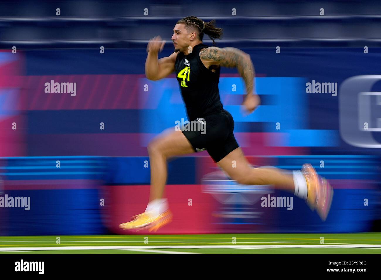 Miami defensive lineman Tyler Baron runs a 40-yard dash at the NFL ...