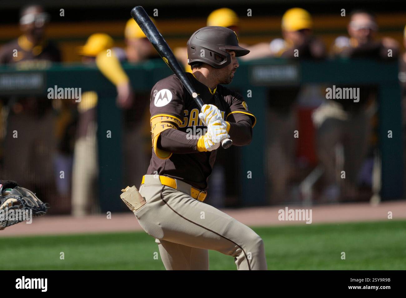 San Diego Padres' Tyler Wade hits against the Athletics during a spring ...