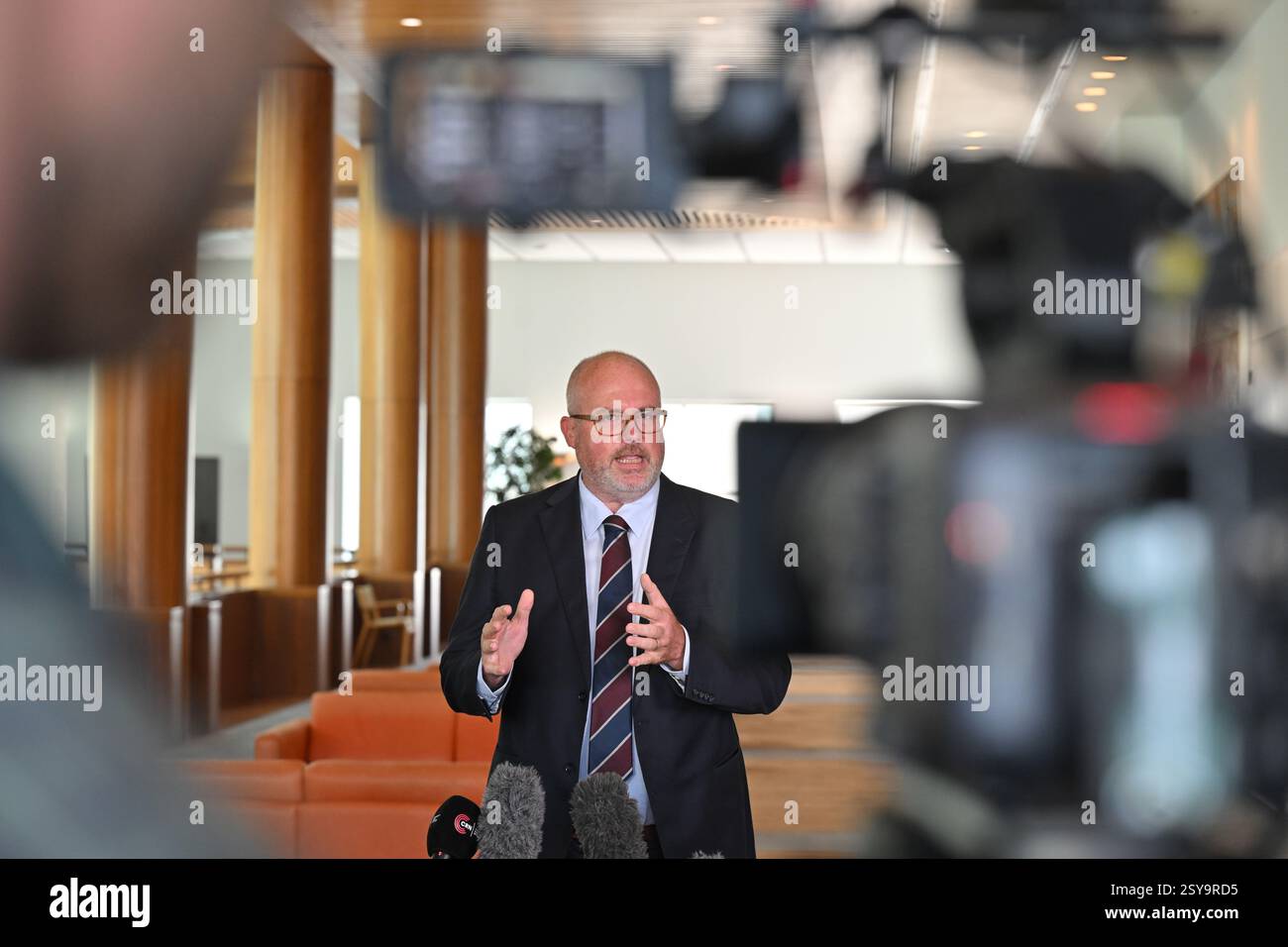 Assistant Minister for Trade Tim Ayres at a press conference at Parliament House, in Canberra ...