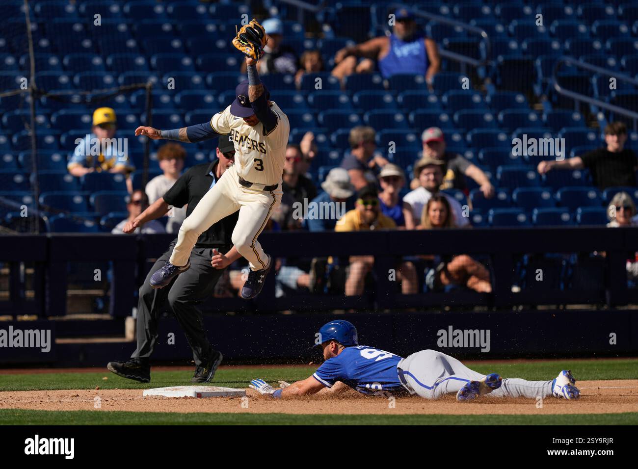 Kansas City Royals' John Rave steals third base as Milwaukee Brewers ...