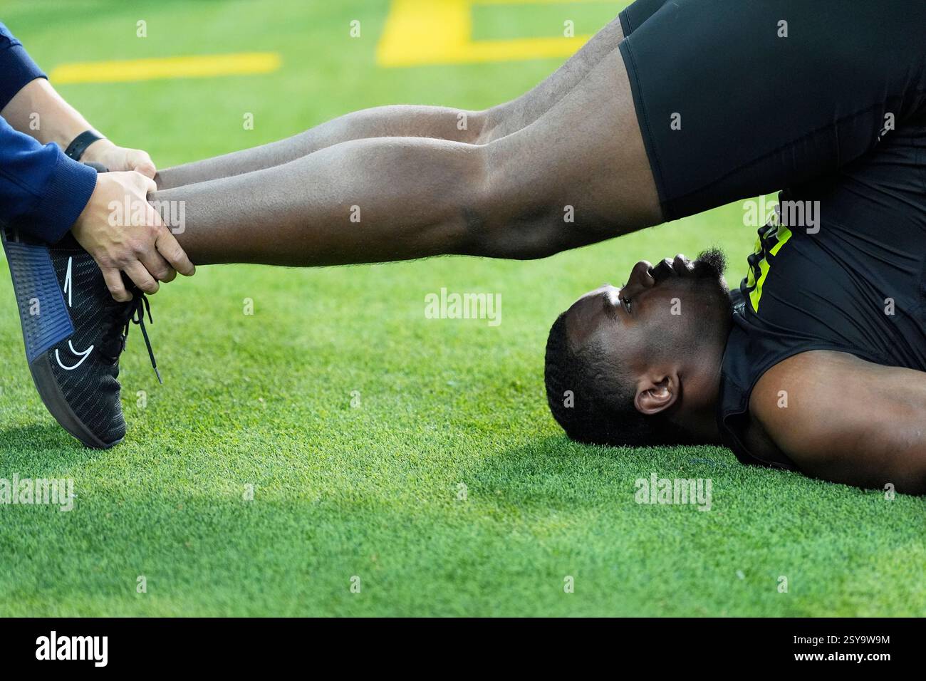 LSU defensive lineman Sai'vion Jones stretches at the NFL football ...