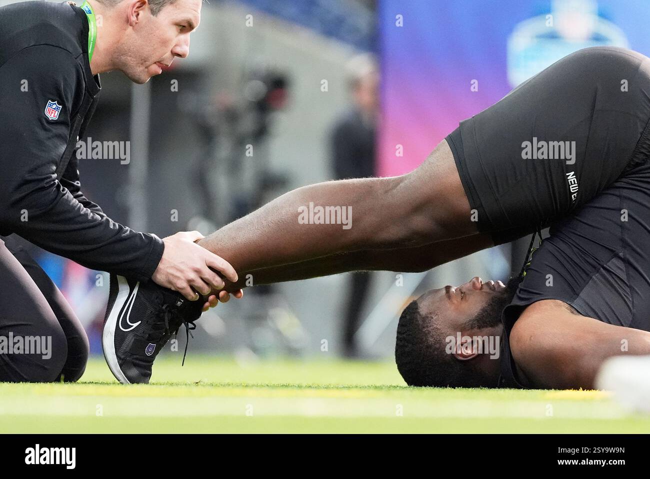 Central Arkansas defensive lineman David Walker stretches at the NFL ...