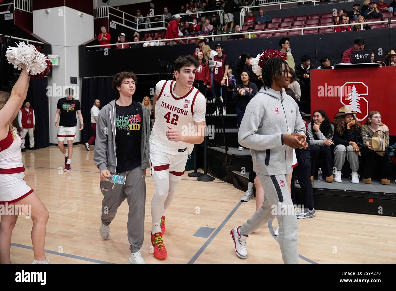 Stanford forward Maxime Raynaud (42) takes the court for an NCAA ...
