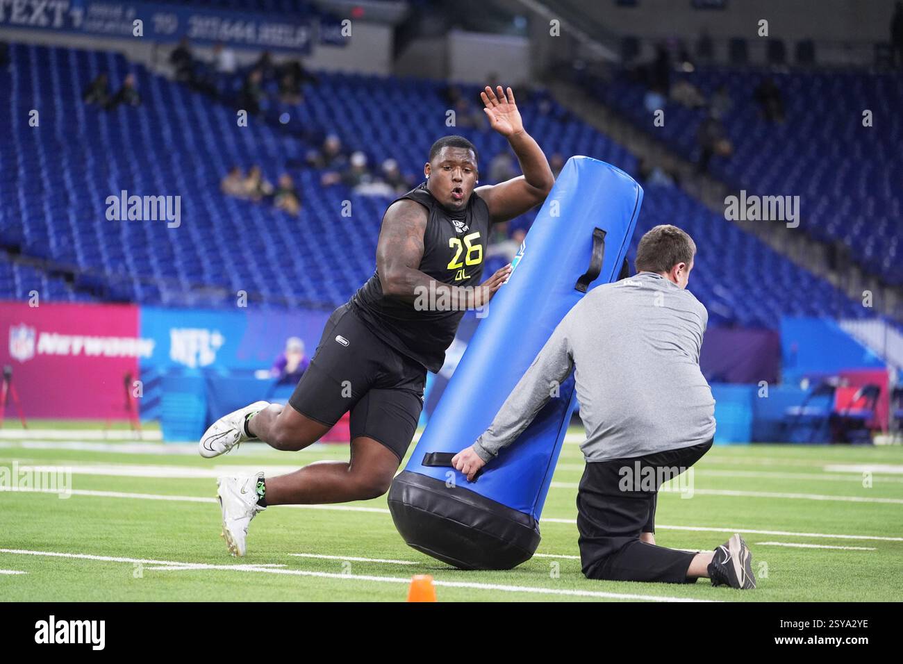 Virginia Tech defensive lineman Aeneas Peebles runs a drill at the NFL ...