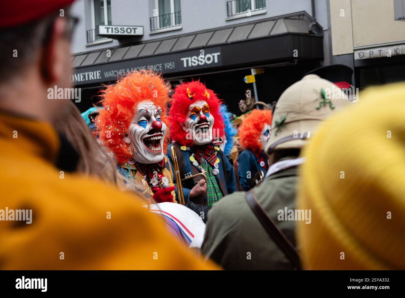 Lucerne, Switzerland. 27th Feb, 2025. A Guggenmusik band wearing large ...
