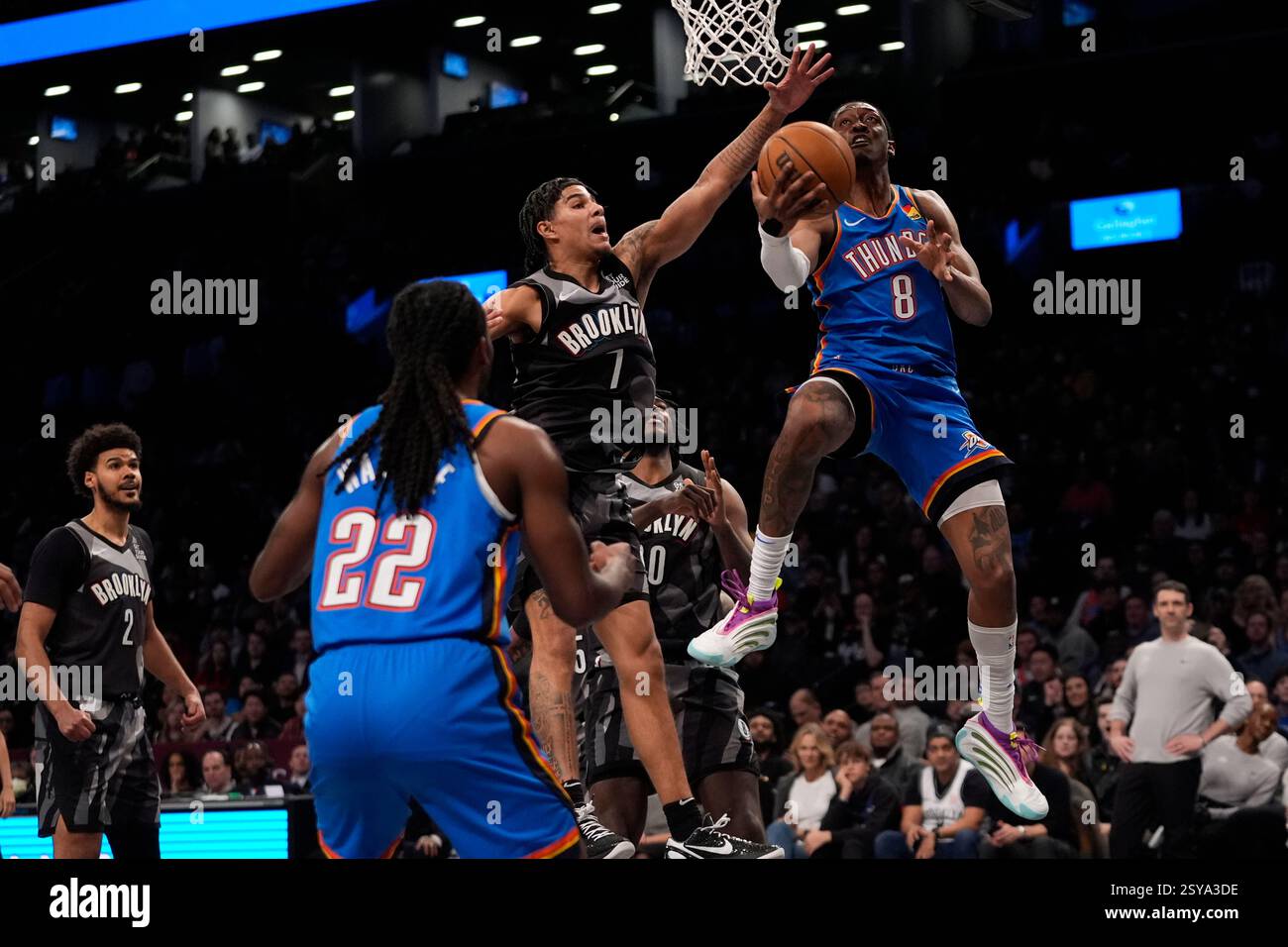 Oklahoma City Thunder's Jalen Williams (8) drives past Brooklyn Nets ...