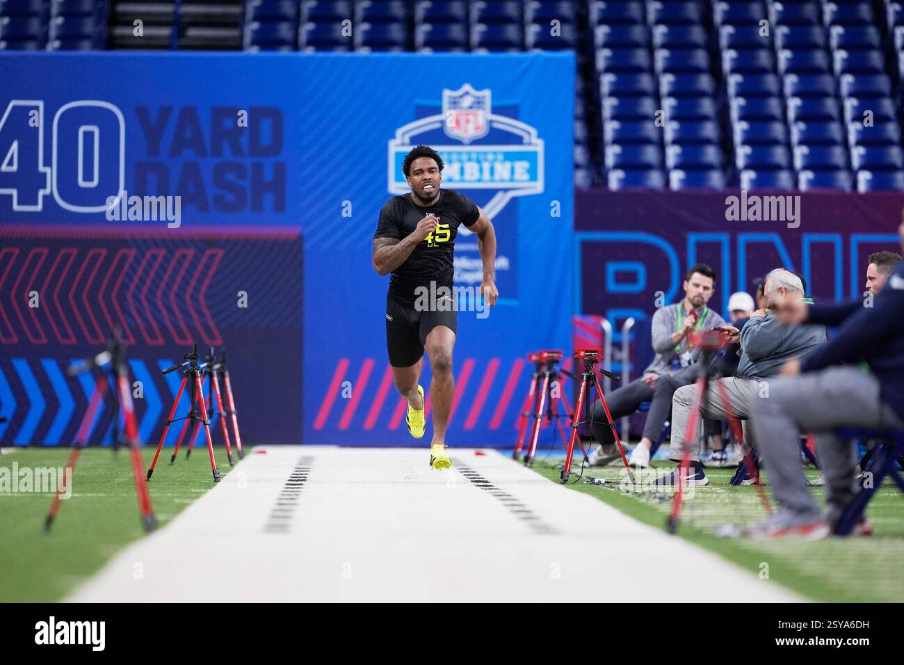 Syracuse defensive lineman Fadil Diggs runs the 40-yard dash at the NFL football scouting ...