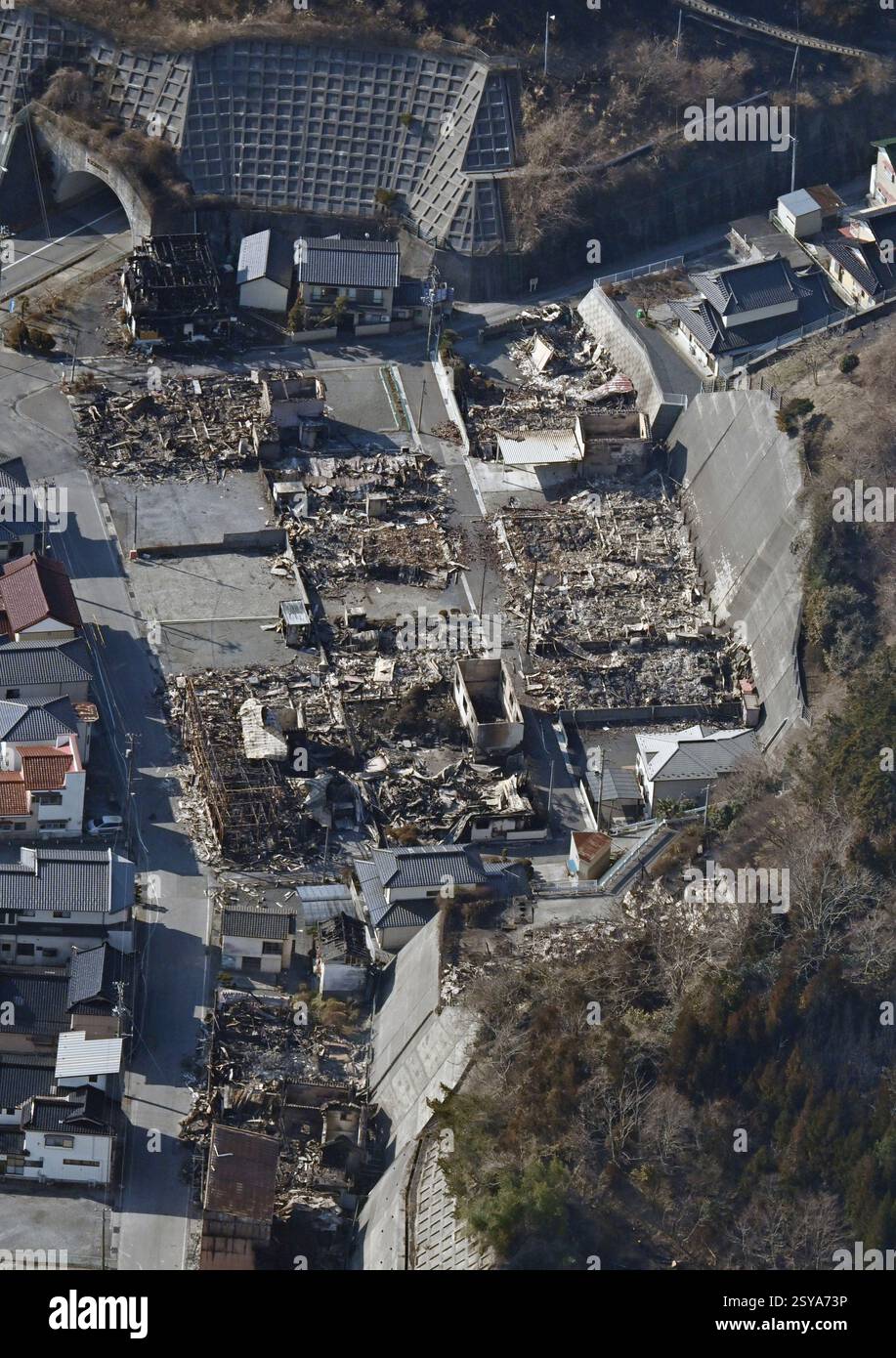 Aerial photo shows a village where many houses were burned down due to ...