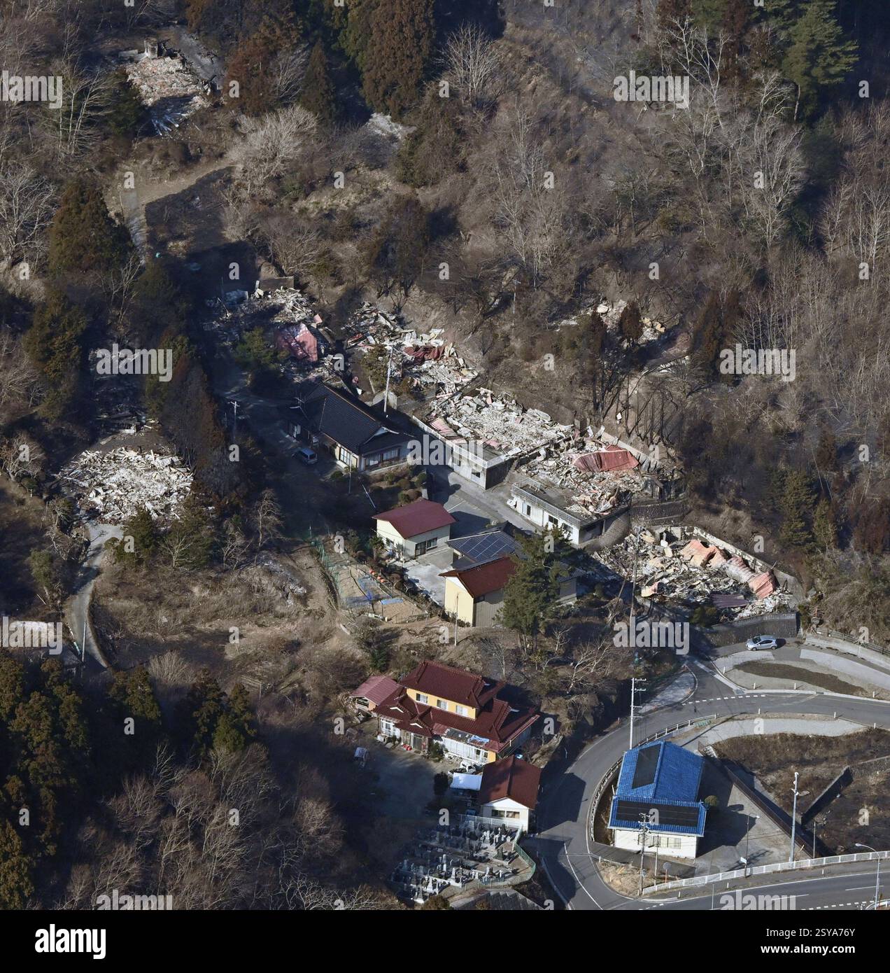 Aerial photo shows a village where many houses were burned down due to ...