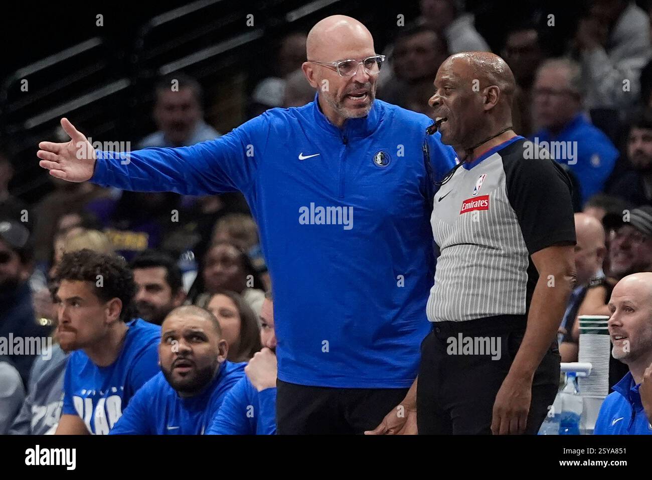 Dallas Mavericks head coach Jason Kidd, left, questions a call to ...