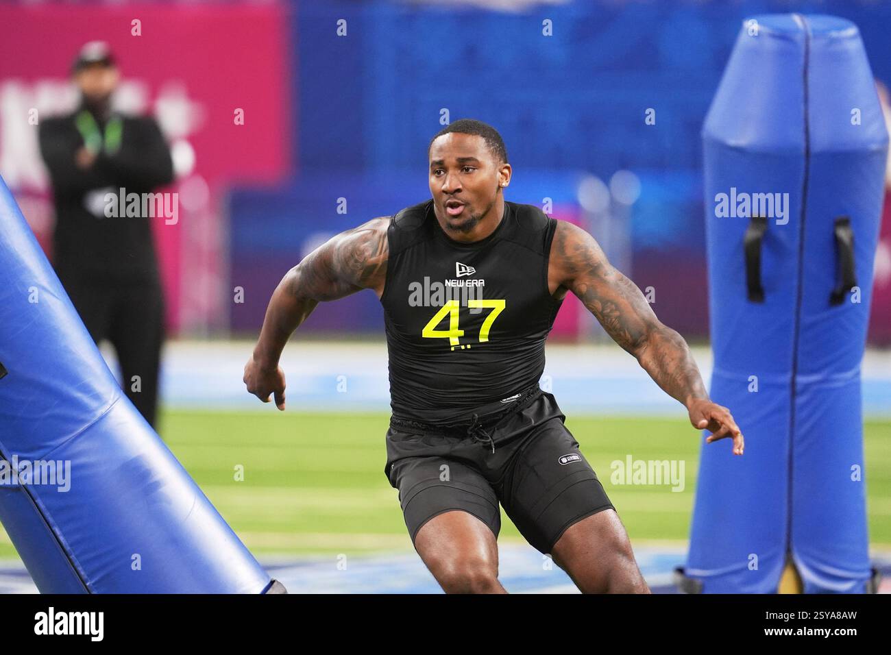 Boston College defensive lineman Donovan Ezeiruaku runs a drill at the ...