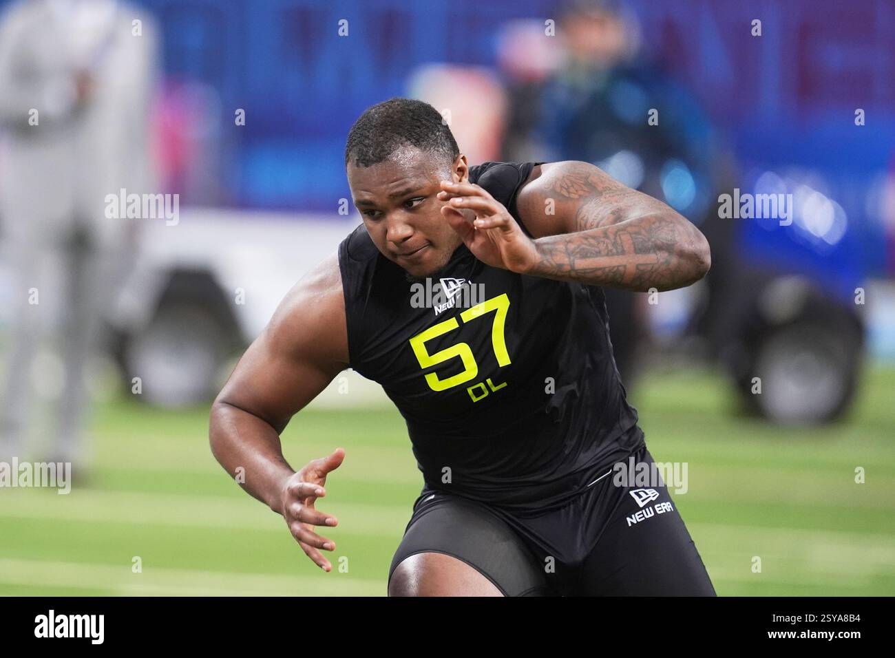 West Virginia defensive lineman Sean Martin runs a drill at the NFL ...