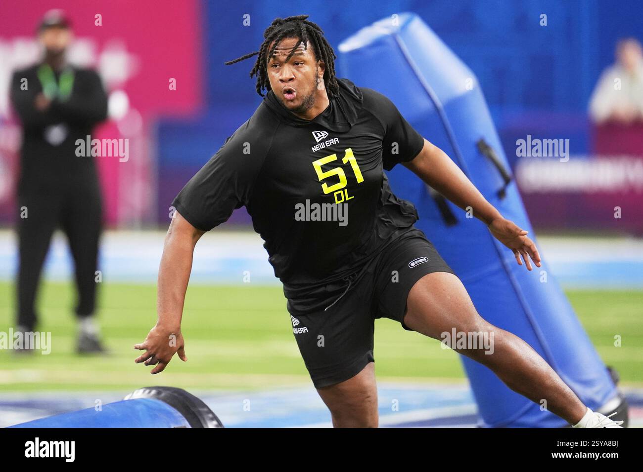 Mississippi defensive lineman Jared Ivey runs a drill at the NFL ...