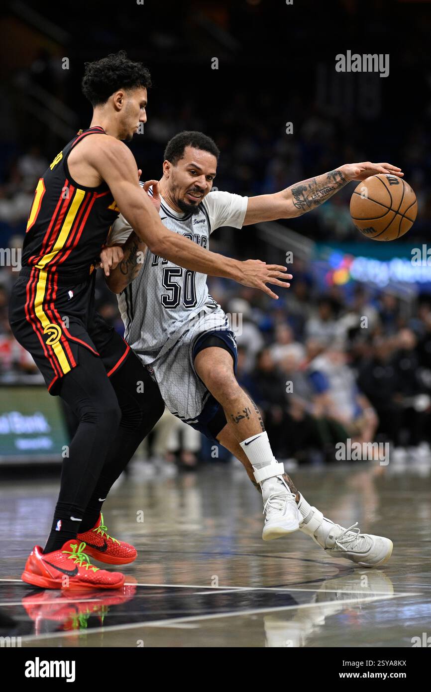 Orlando Magic guard Cole Anthony (50) is defended by Atlanta Hawks ...