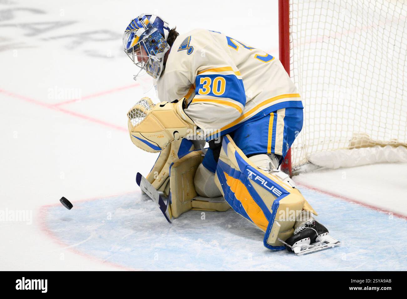 St. Louis Blues goaltender Joel Hofer (30) tracks the puck during the ...
