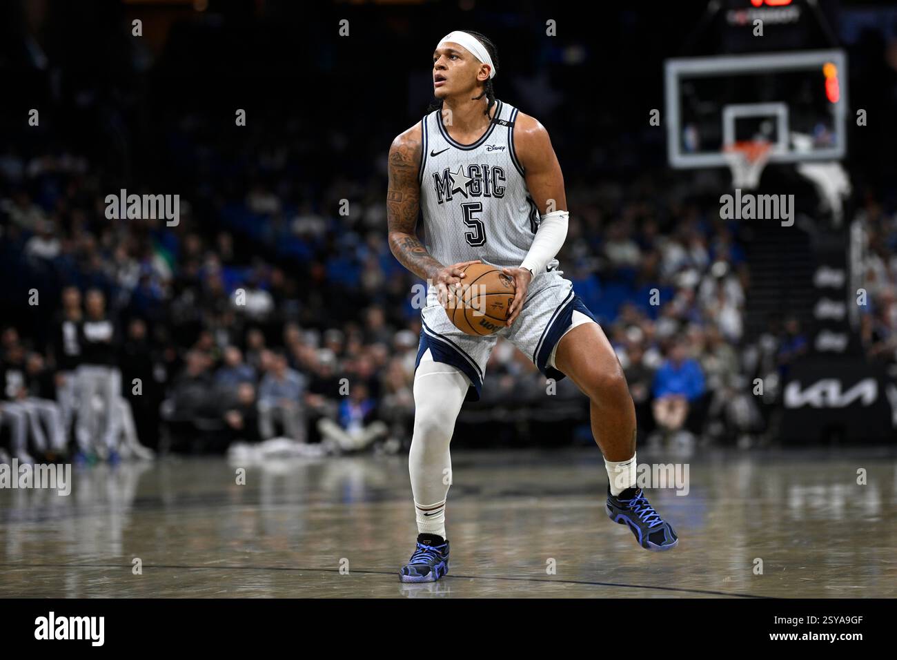 Orlando Magic forward Paolo Banchero (5) sets up to shoot during the second half of an NBA ...