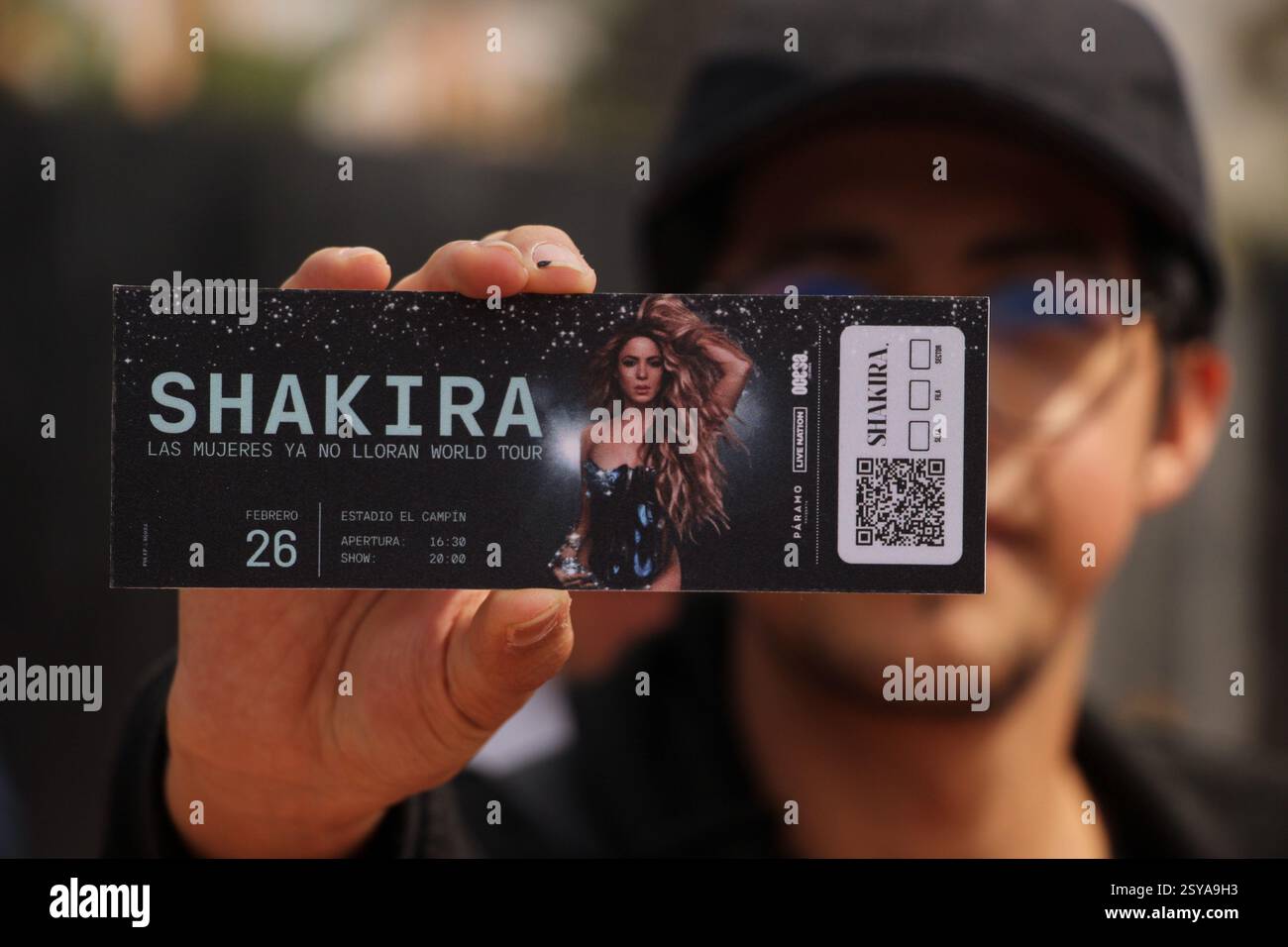 Bogota, Colombia. 26th Feb, 2025. A Shakira fan holds his ticket ahead ...