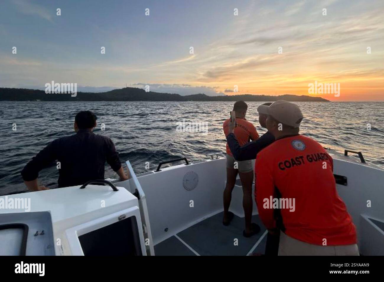 In this photo provided by Philippine Coast Guard Batangas, rescuers ...