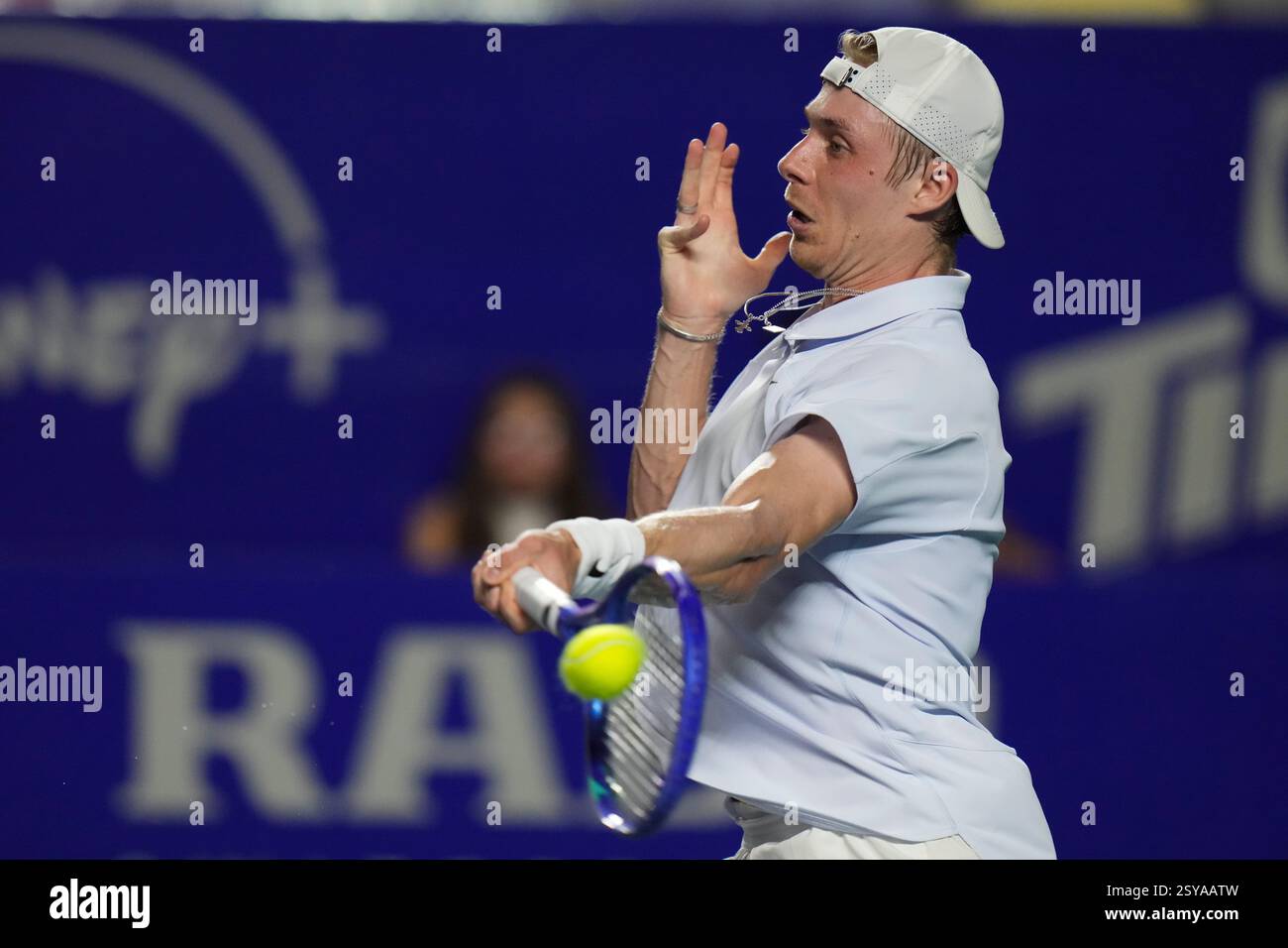 Denis Shapovalov of Canada hits a return to Marcos Giron of the U.S. during a Mexican Open ...
