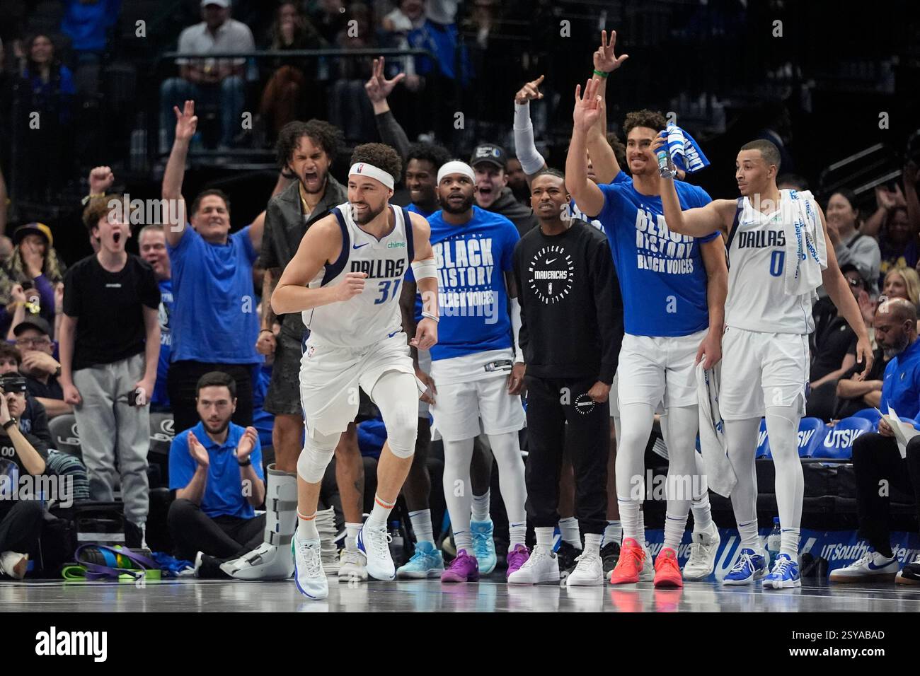 Dallas Mavericks guard Klay Thompson (31) is cheered by the bench after ...