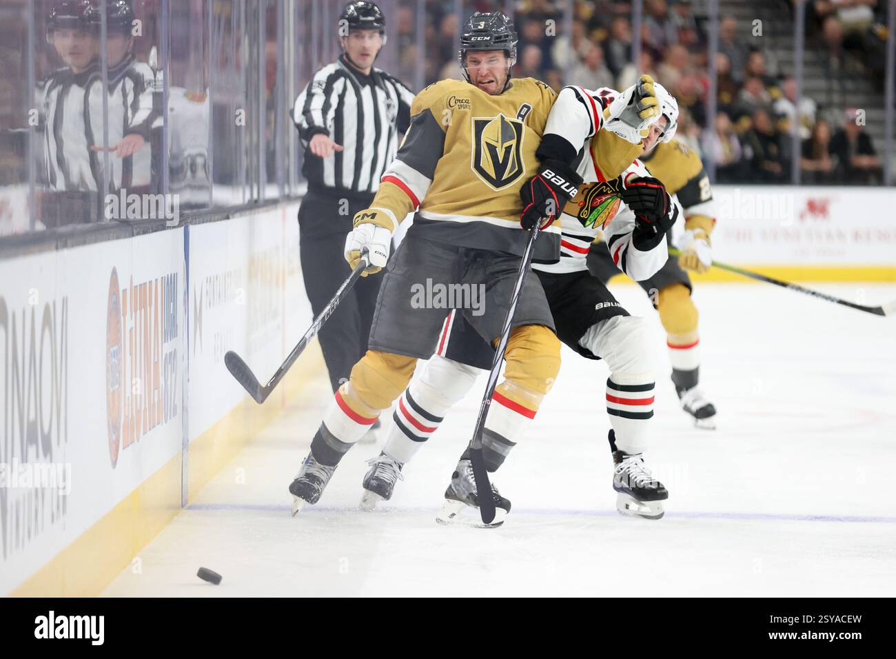Vegas Golden Knights defenseman Brayden McNabb (3) gets tangled up with ...