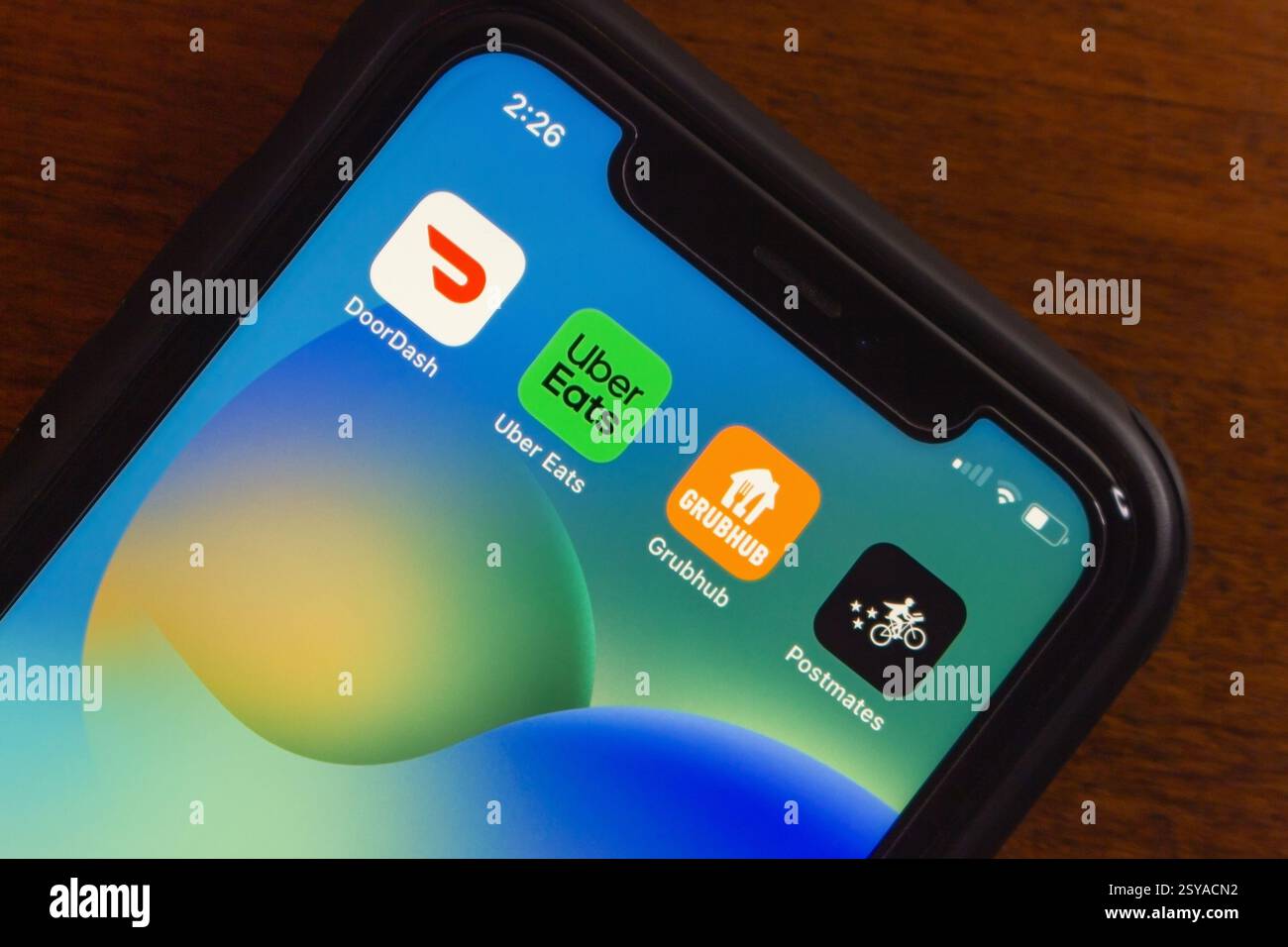 DoorDash, Uber Eats, Grubhub and Postmates icons are displayed on an ...