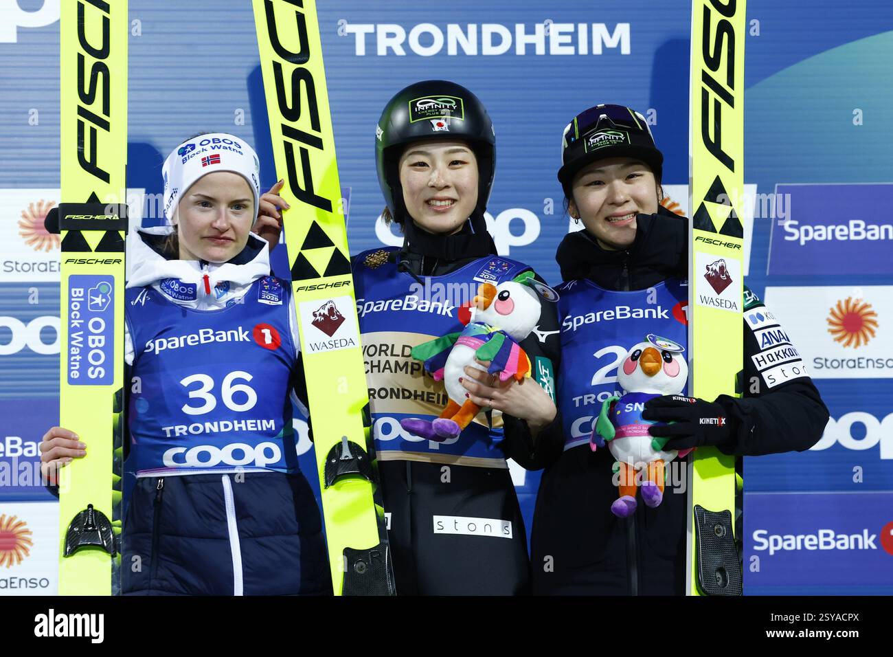 Women's Nordic combined winner Yuna Kasai (C) of Japan poses for a ...