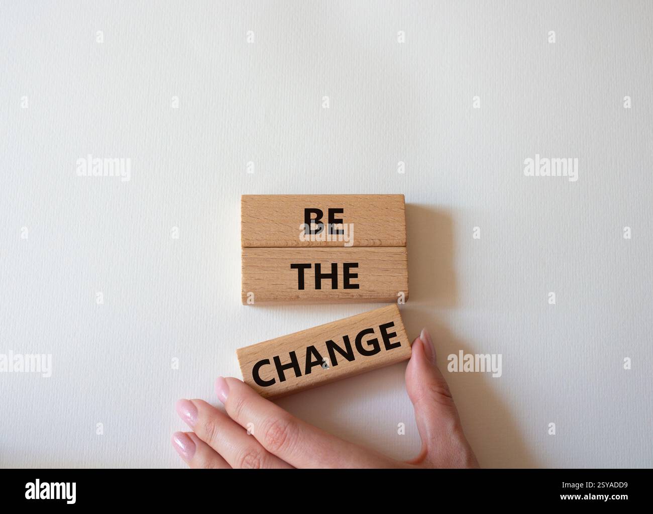 Be the change symbol. Concept word Be the change on wooden blocks ...
