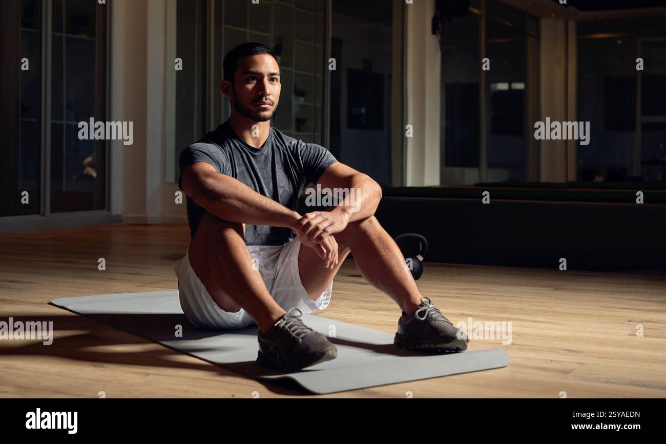 Thinking, fitness and relax with man in gym for workout, reflection and ...