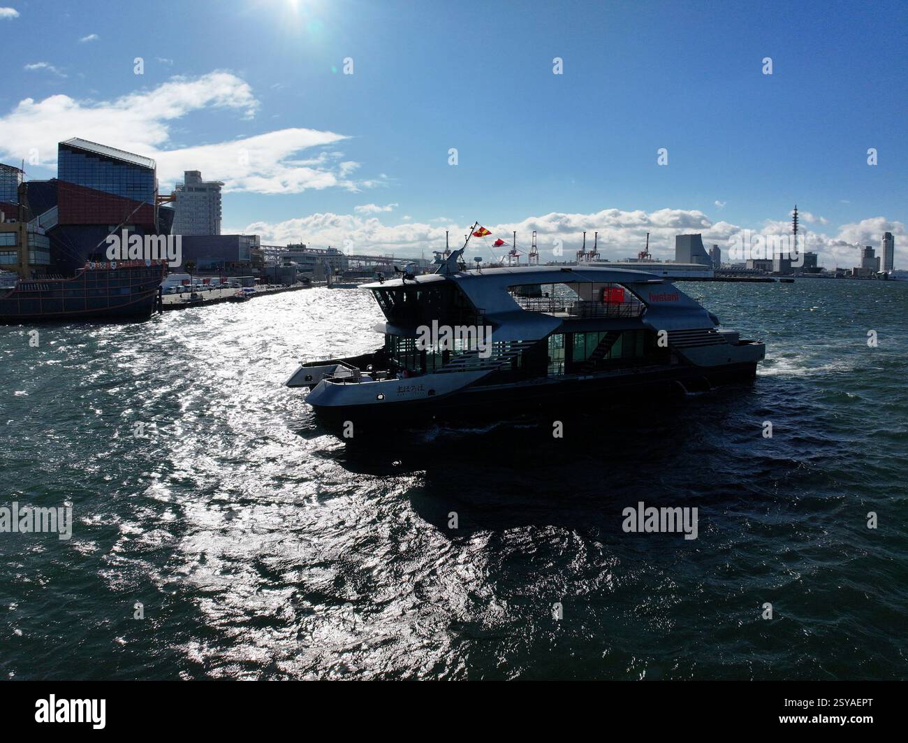 A photo shows the hydrogen fuel cell ship "Mahoroba," which means ...