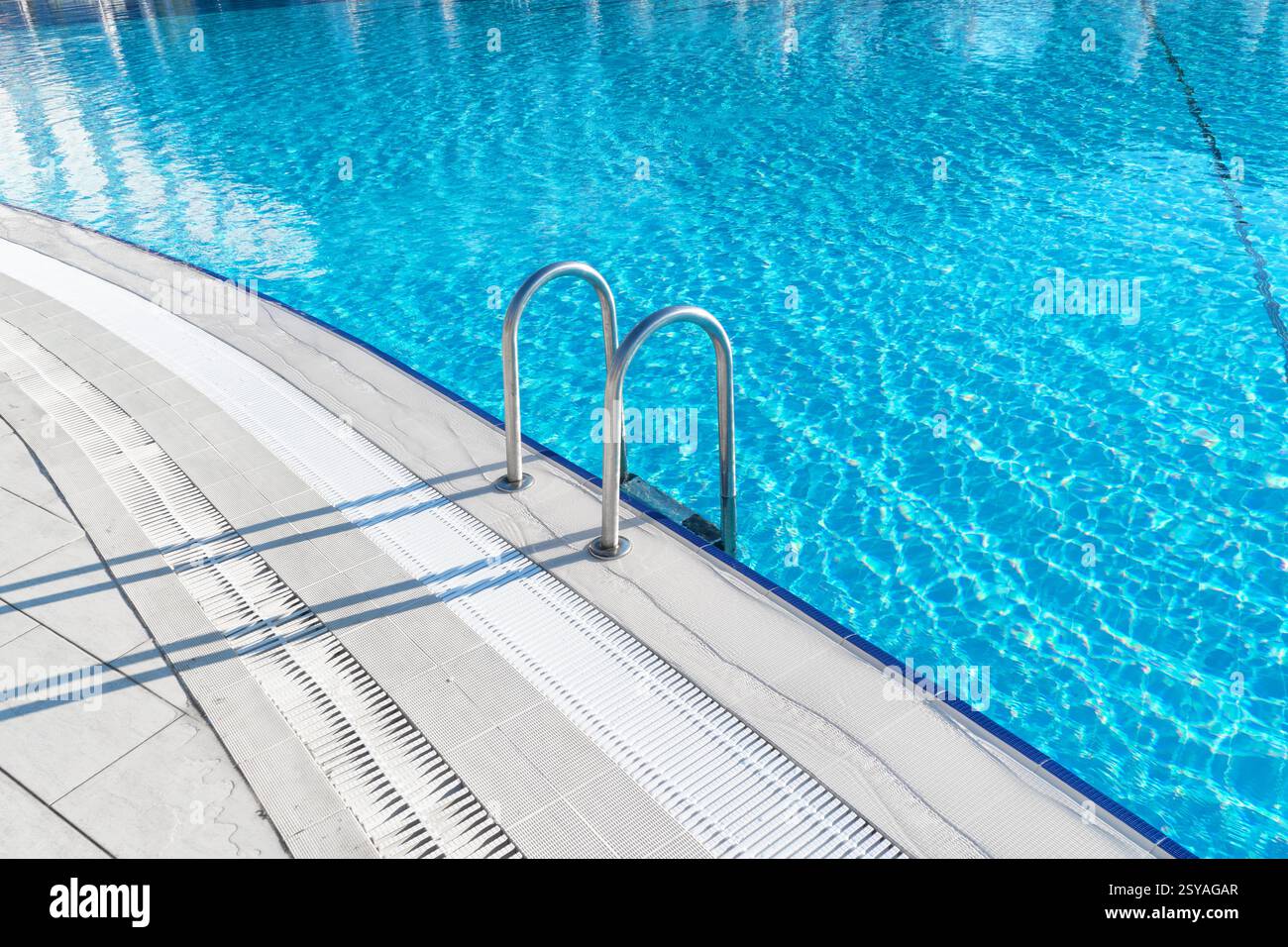Swimming pool with stair and water. Swimming pool with handrail ...