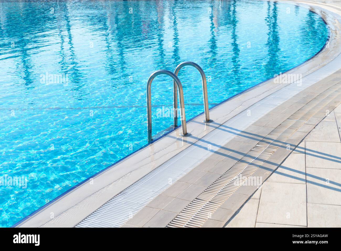 Swimming pool with stair and water. Swimming pool with handrail ...