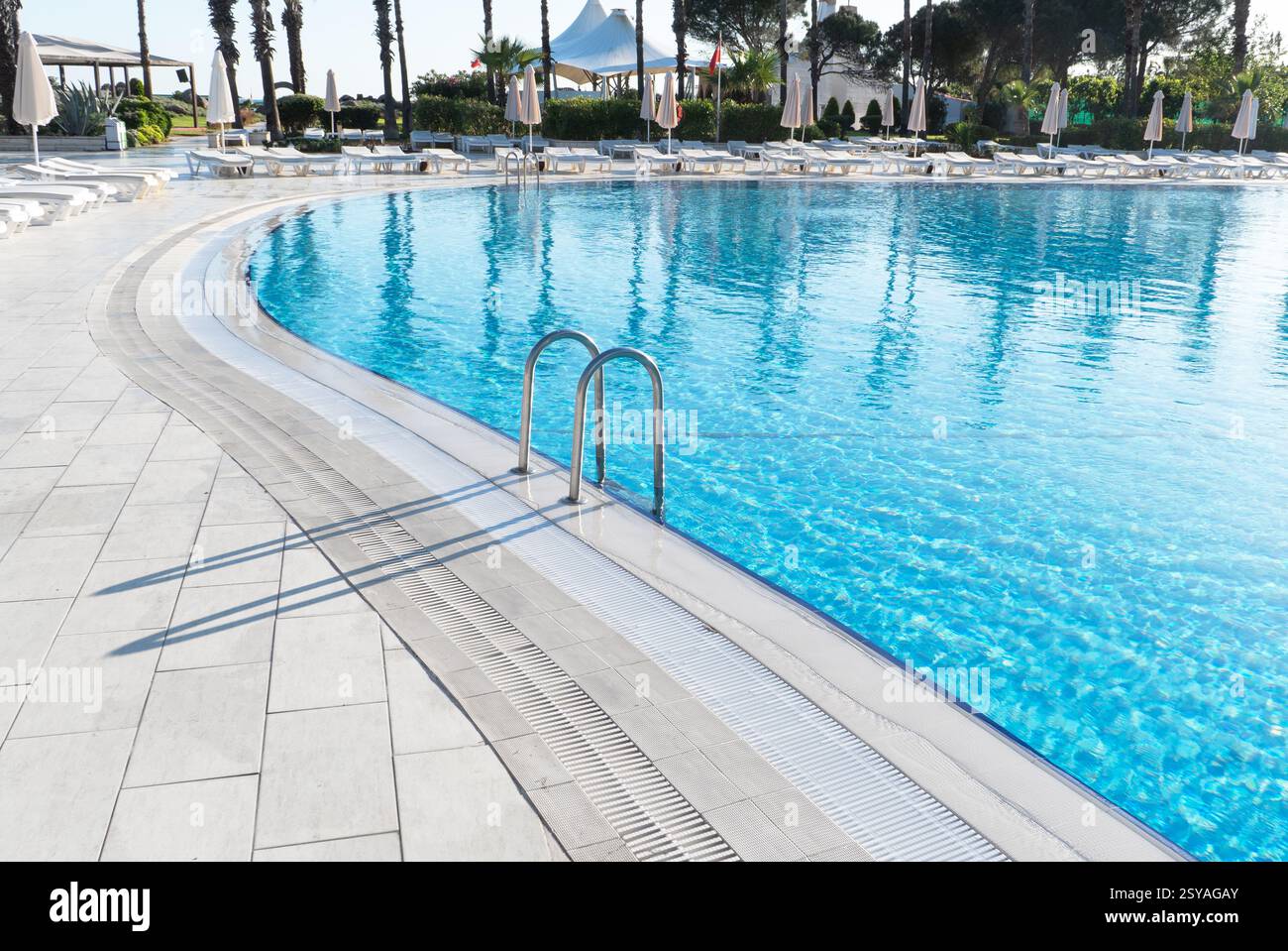 Swimming pool with stair and water. Swimming pool with handrail ...