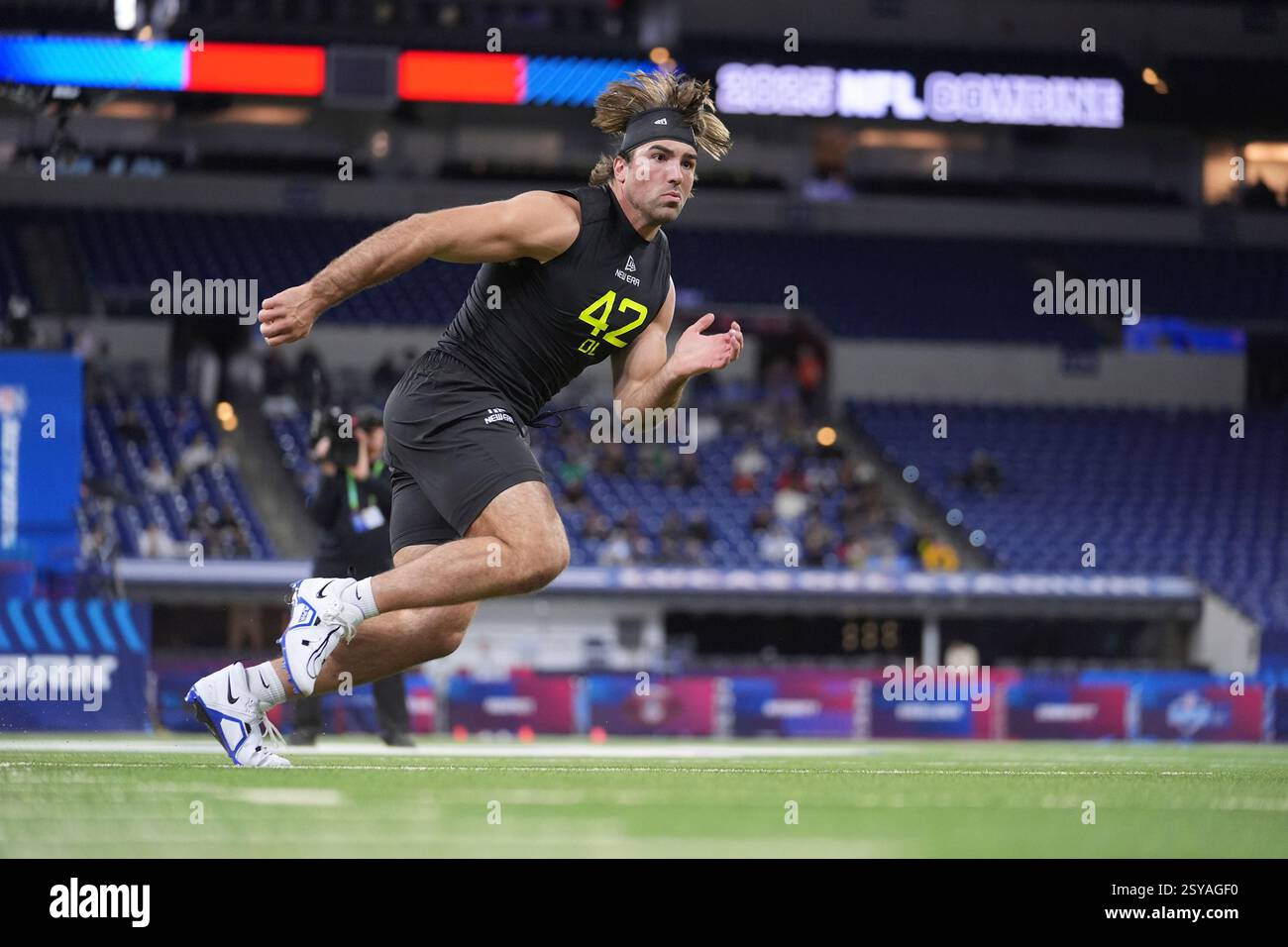 BYU defensive lineman Tyler Batty runs a drill at the NFL football ...