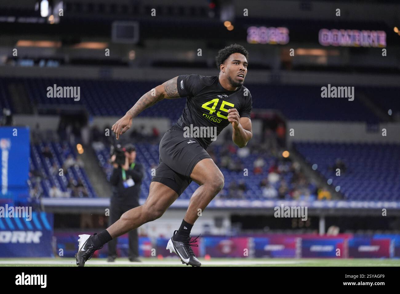 Syracuse defensive lineman Fadil Diggs runs a drill at the NFL football ...