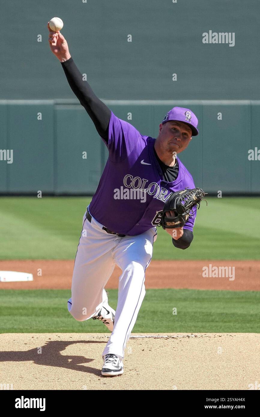 Colorado Rockies pitcher Bradley Blalock (64) throws warms up pitches ...