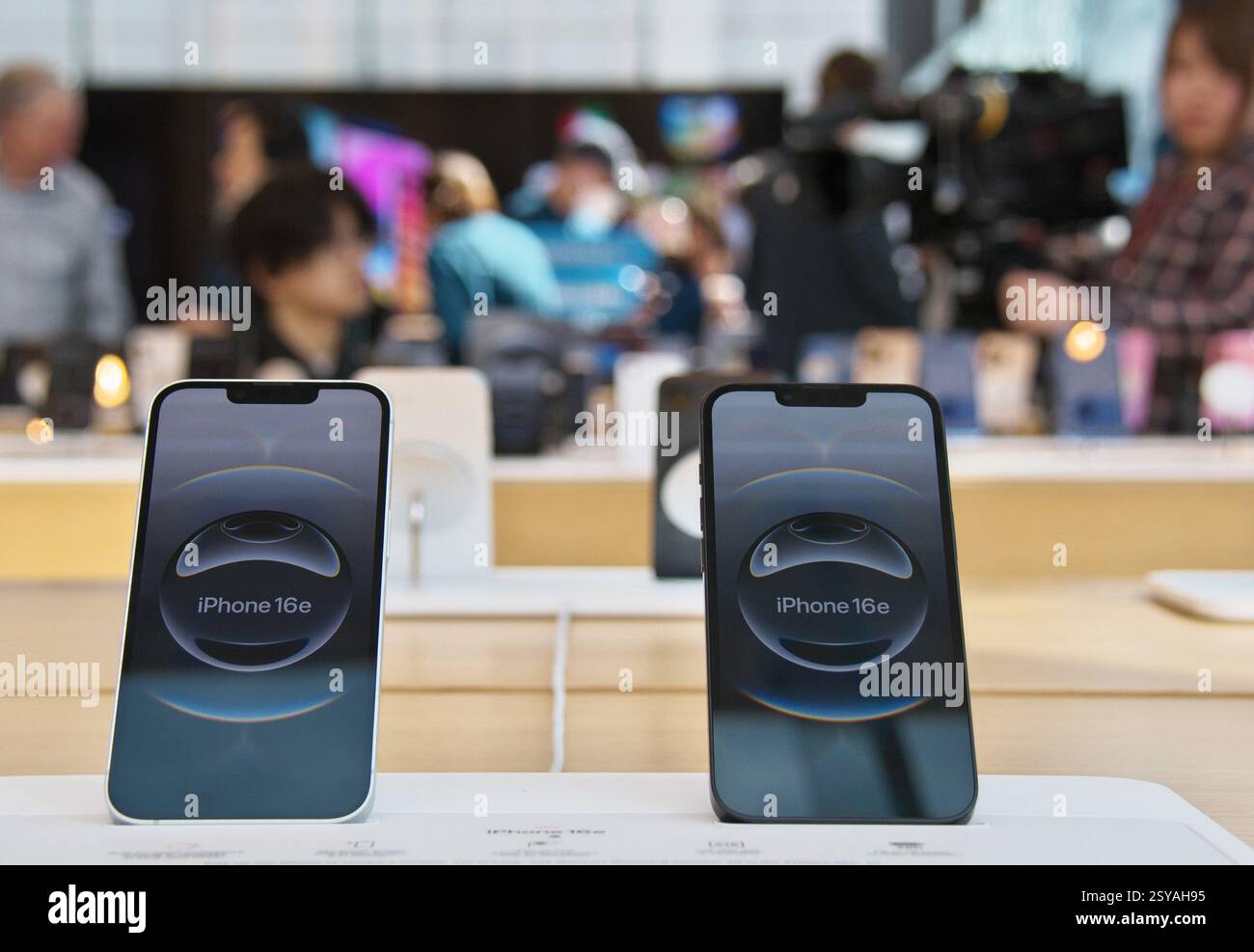 Apple's new iPhone 16e are displayed during the launch day for new ...