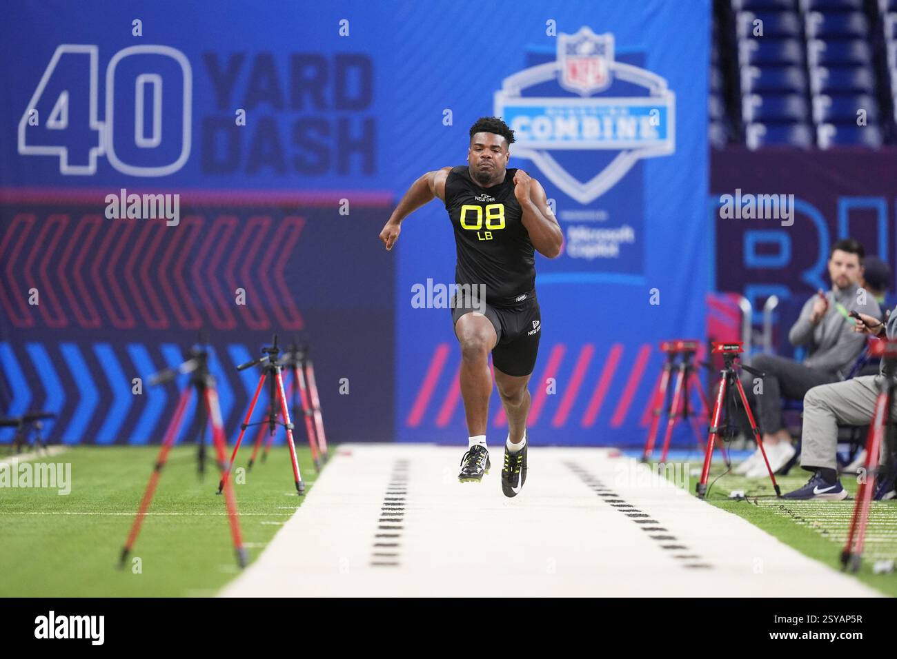 Iowa linebacker Jay Higgins runs the 40-yard dash at the NFL football ...