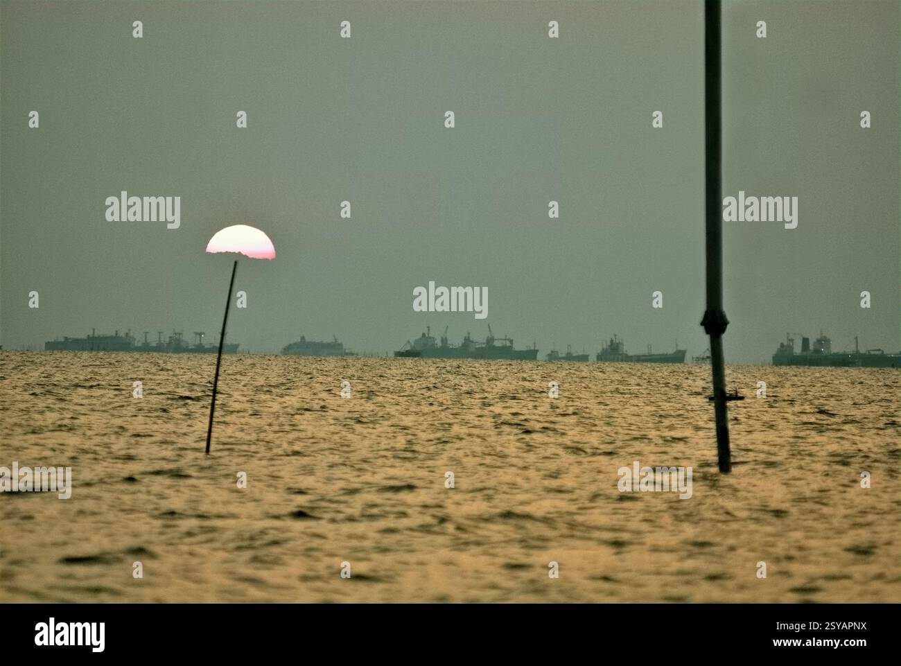 Traffic of Jakarta Port and Jakarta Bay as seen before sunset time from ...