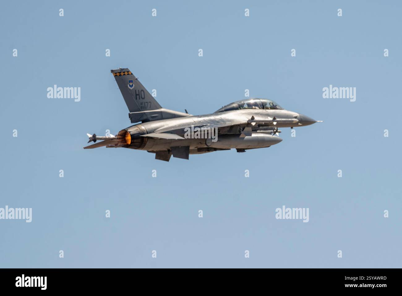 An F-16 Viper assigned to the 54th Fighter Group soars through the sky ...