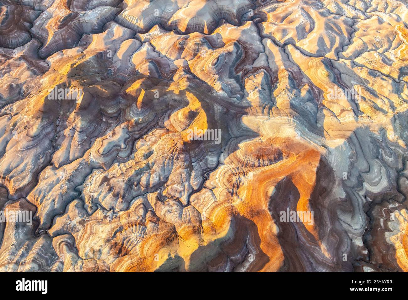Aerial view showcases vibrant bentonite formations in Utah. The ...