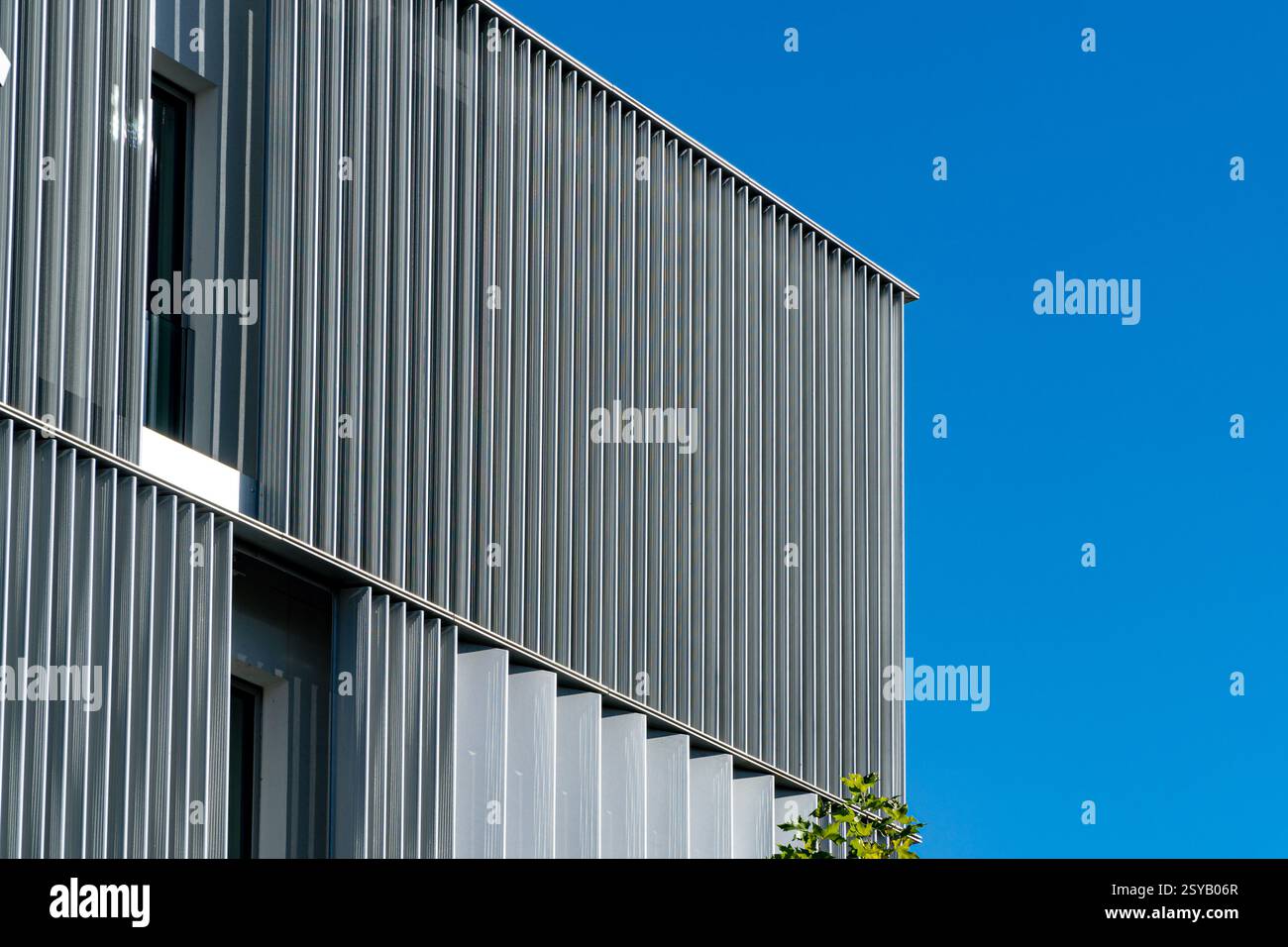A crisp image highlighting the ribbed facade of a modern building ...