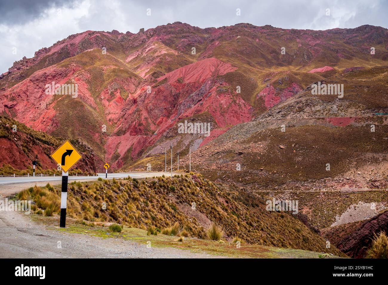 A stunning view of the Peruvian Andes, featuring vibrant red mountain ...