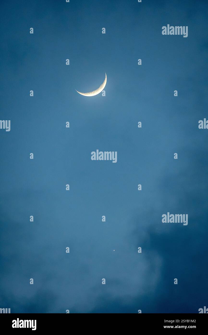 A captivating visual of the crescent moon paired with Venus in the ...